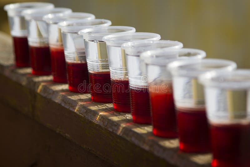 The Cocktail of Vodka and Syrup in Plastic Cups Outdoors Stock Photo ...