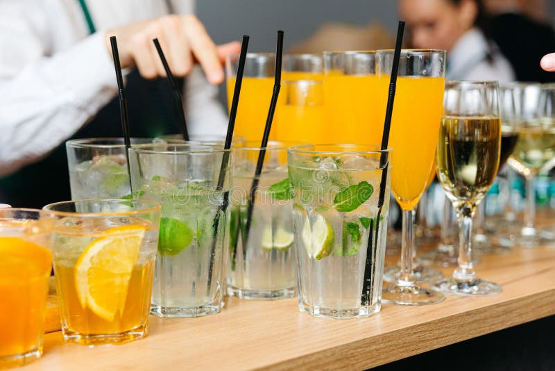 Cocktails in the Bar. Close-up of a Group of Glasses with Drinks on the ...