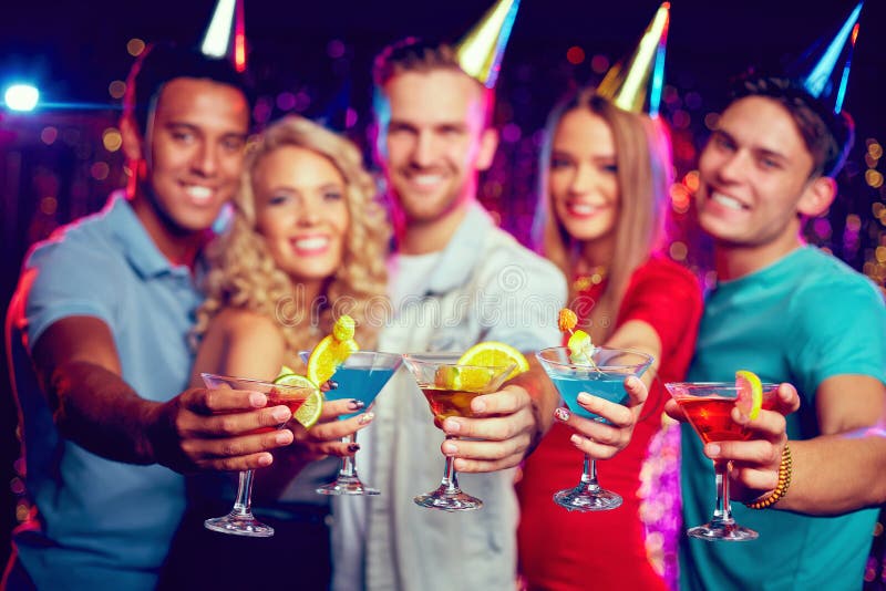 Cocktails in hands stock image. Image of cheering, clubbing - 60481575