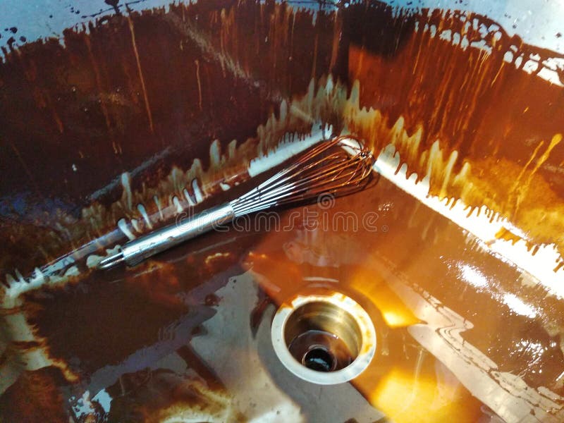 Coco sauce spill in sink stock image. Image of spill - 223149467