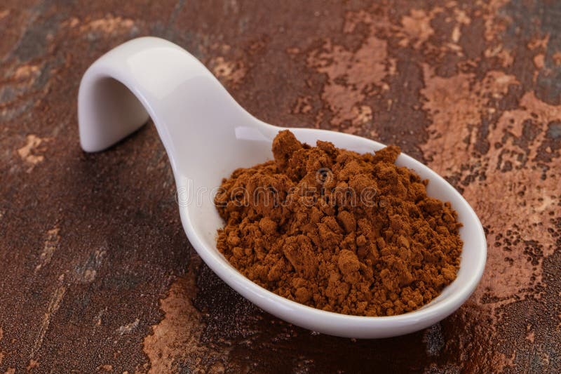 Cocoa powder in the bowl stock photo. Image of isolated - 184783058