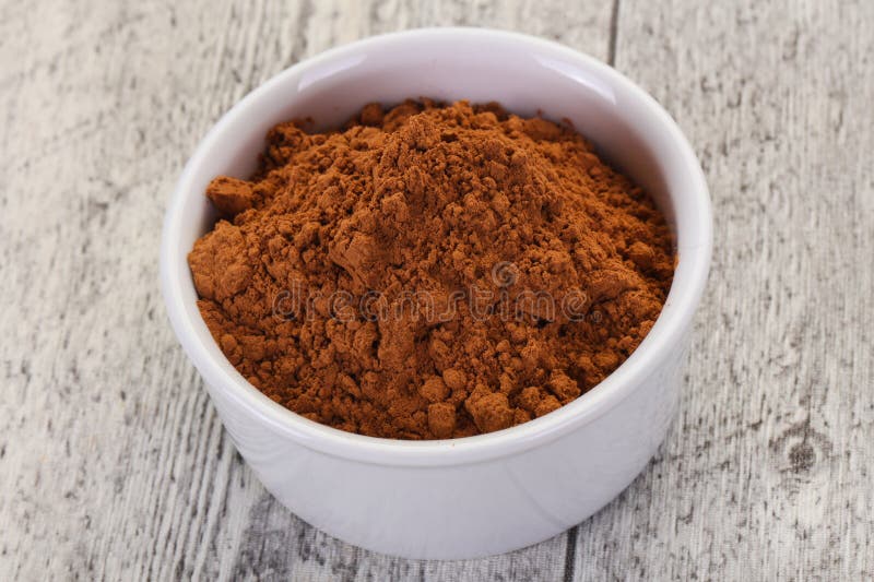Cocoa powder in the bowl stock image. Image of milled - 195828947