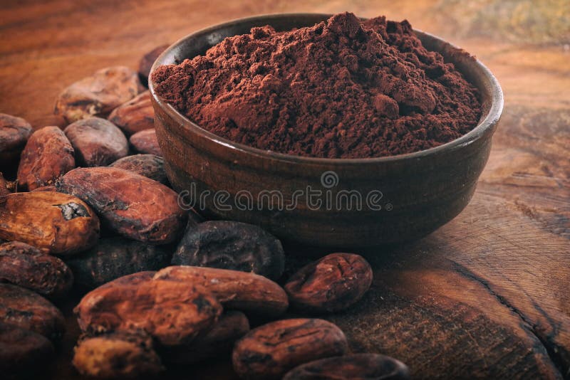 Cocoa Powder and Coffee Beans on a Wooden Table Stock Photo - Image of ...