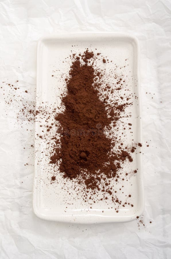 Cocoa Powder on a White Plate Stock Photo - Image of sweet, aroma: 35647684