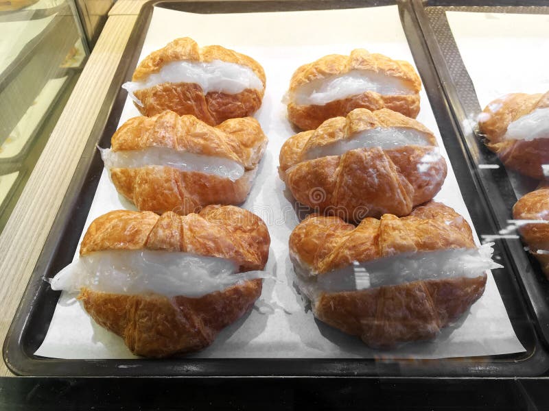 Coconut Cream Croissant in Bakery Shop Stock Image - Image of yellow ...