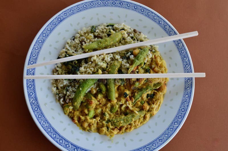 Coconut Cury with Vegetables and Brown Rice Stock Photo - Image of ...