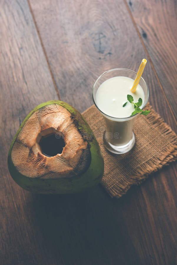 Coconut Flavoured Plain White Lassi or Milk Shake Garnished with a ...