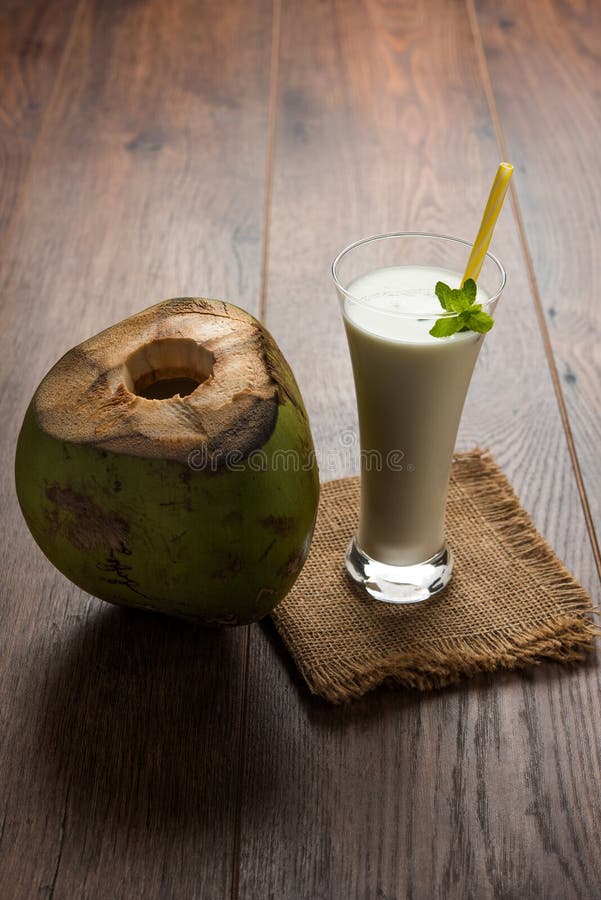 Coconut Flavoured Plain White Lassi or Milk Shake Garnished with a ...