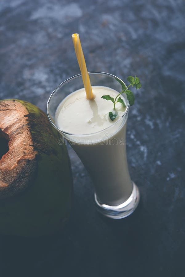 Coconut Flavoured Plain White Lassi or Milk Shake Garnished with a ...
