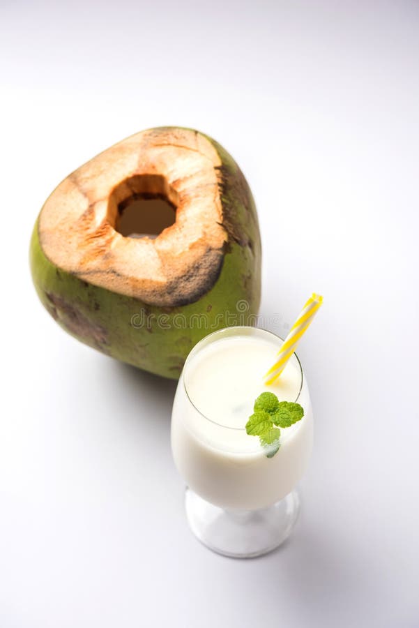 Coconut Flavoured Plain White Lassi or Milk Shake Garnished with a ...
