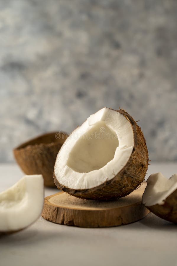 Coconut Fresh Nut Fruit Pieces on Bright Background Stock Photo - Image ...