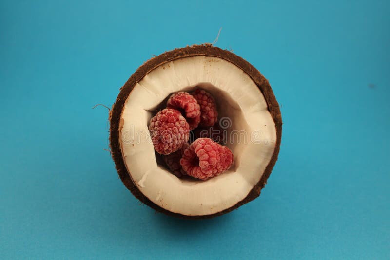Coconut with raspberries stock image. Image of health - 107136665