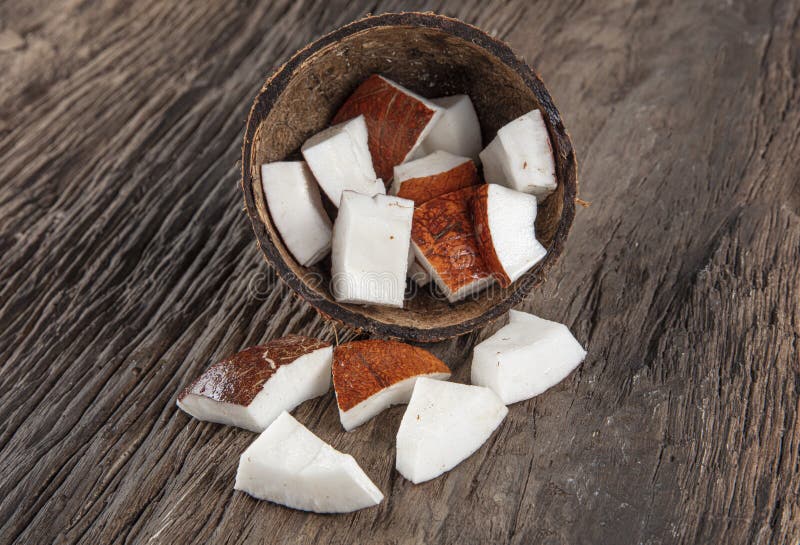 Coconut Halves, Coconut Pieces on Wooden Background Top View ...