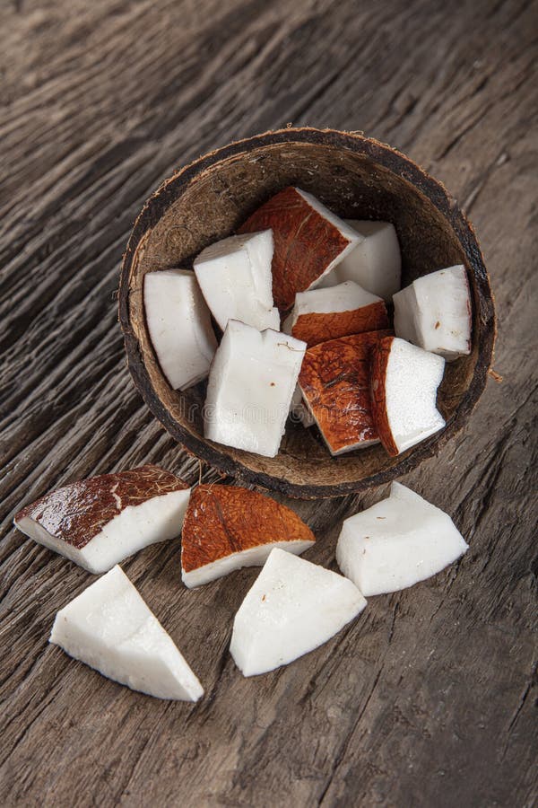 Coconut Halves, Coconut Pieces on Wooden Background Top View ...