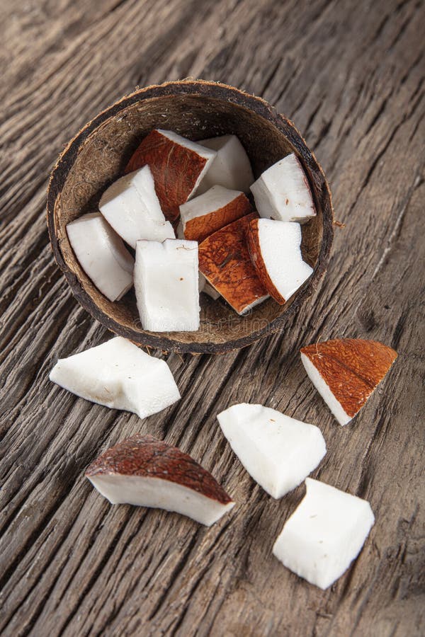 Coconut Halves, Coconut Pieces on Wooden Background Top View ...