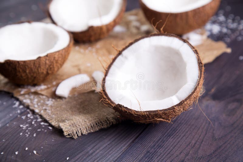 Coconut halves with shell stock photo. Image of copy - 77146190