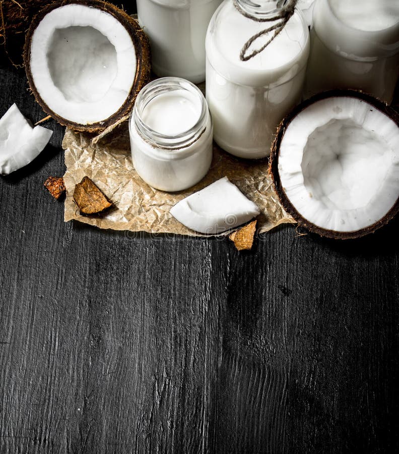 Coconut Milk Pouring Side View Isolated on White Background Stock Photo ...