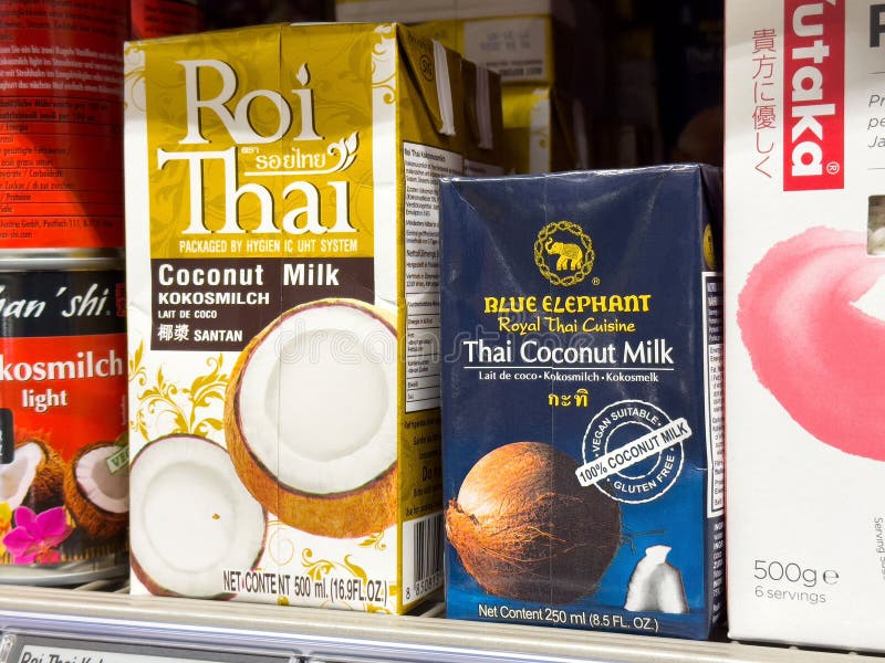 Coconut Milk Varieties in Grocery Store Aisle Featuring Diverse Asian ...