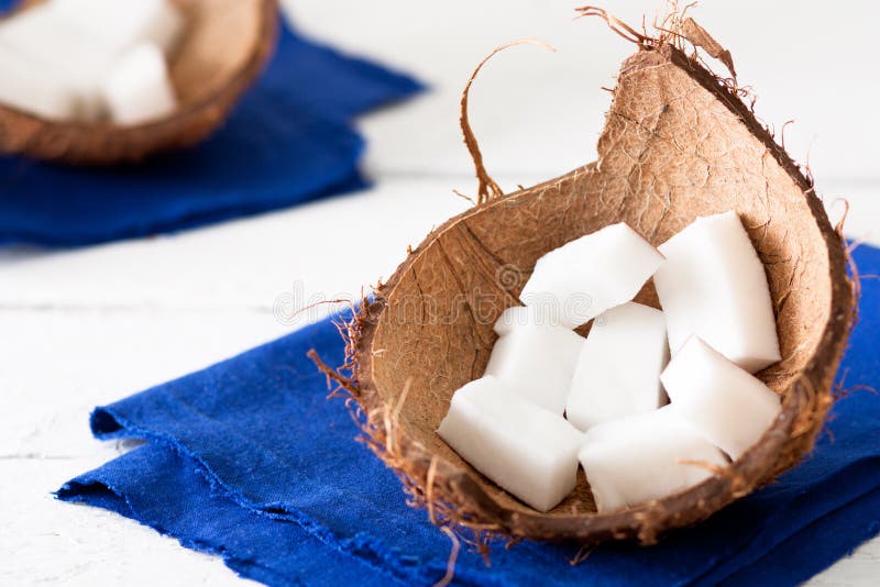 Coconut Pieces in a Shell stock image. Image of shell - 20779479