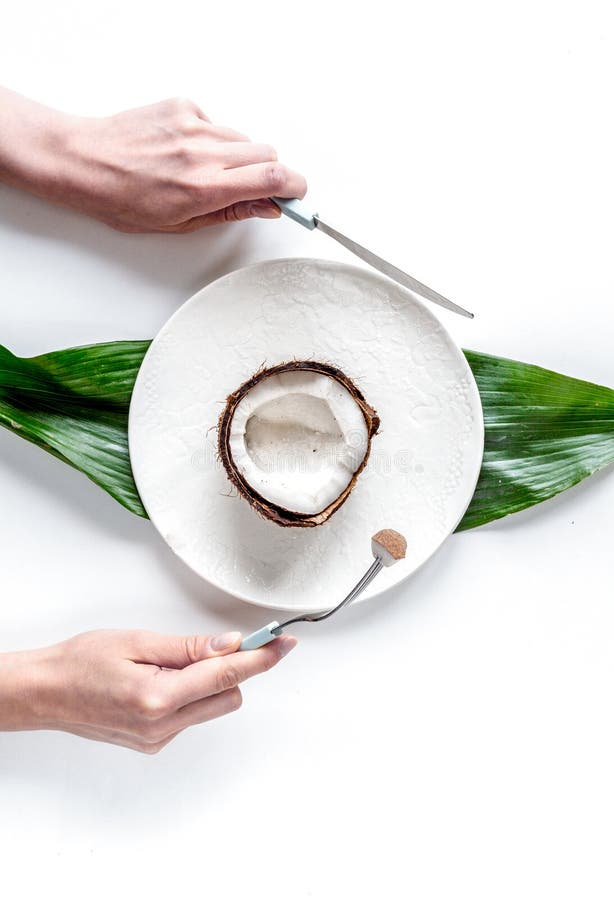 Coconut on Plate Top View on White Background Stock Photo - Image of ...