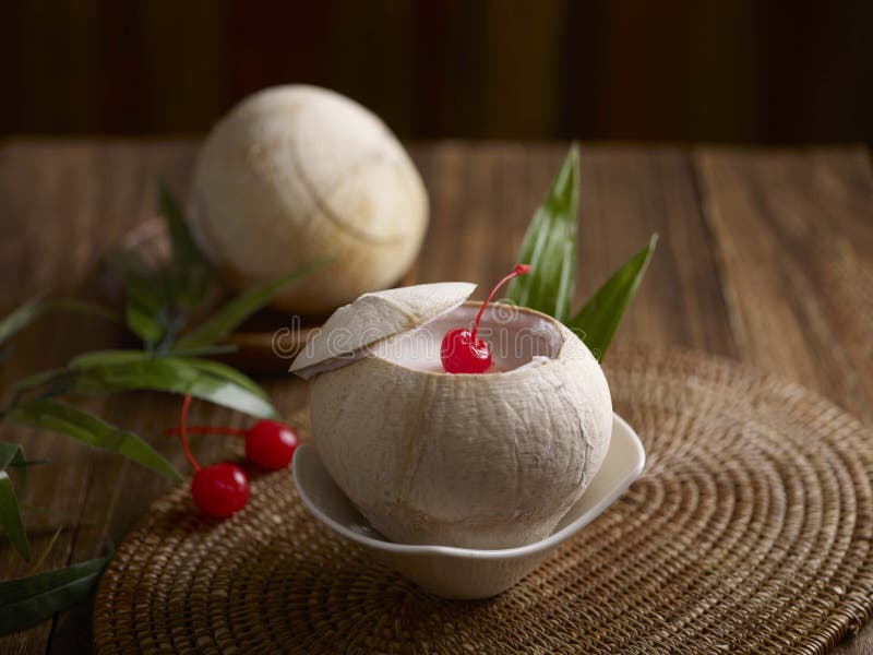 Coconut Pudding with Raspberry Served in a Dish Isolated on Table Side ...