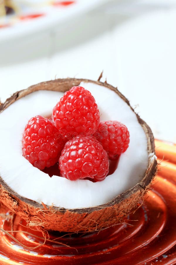 Coconut and raspberries stock photo. Image of sweet, snack - 54395356
