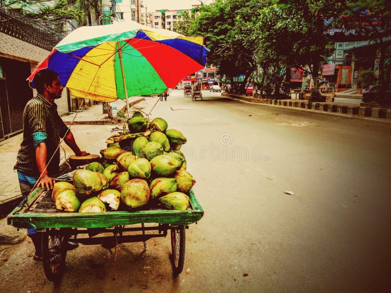 Coconut Salesman editorial stock photo. Image of salesman - 124485443