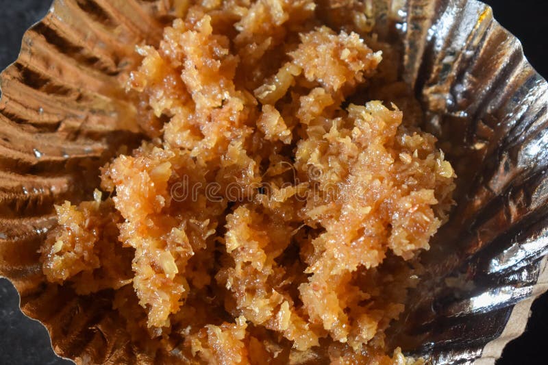 Coconut Sweet - Prepared with Grated Coconut and Jaggery in Low Flame ...