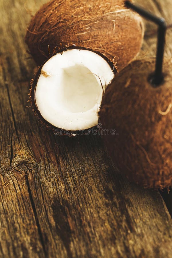 Coconut on the table stock photo. Image of exotic, cracked - 49184922