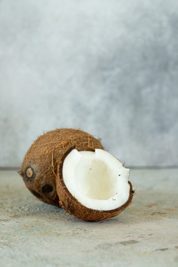 Coconuts and on Textured Stone Background Vertical Stock Image - Image ...