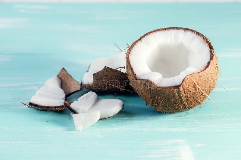 Coconut on Wooden Table on Bright Blurred Background Stock Photo ...