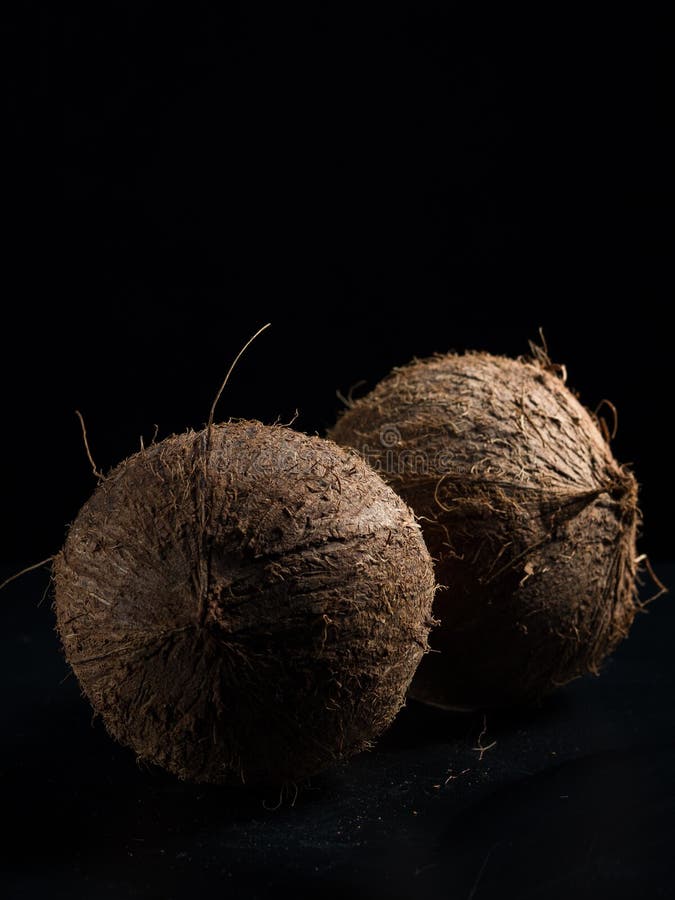 Coconuts On A Dark Wooden Background, Close-up. Fresh Coconut Products ...