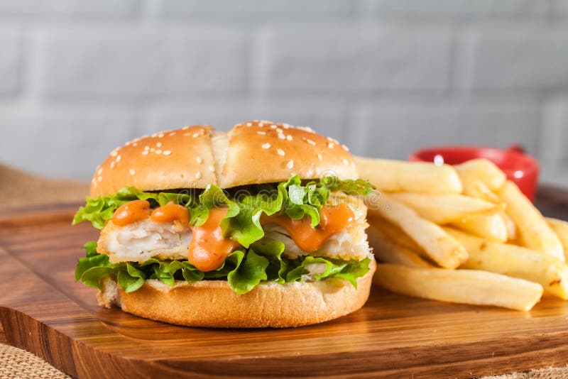 Cod burger and fries stock image. Image of cool, pieces - 242596221