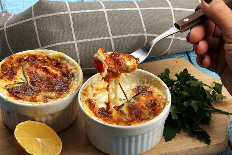 Cod Casserole with Cheese, Sour Cream and Tomatoes Stock Image - Image ...