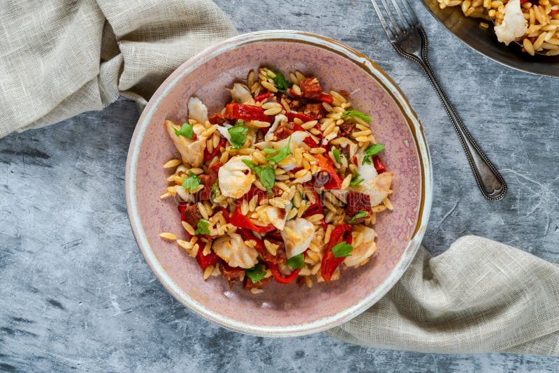 Cod, Chorizo and Orzo Pasta Stock Image - Image of indoors, fried ...