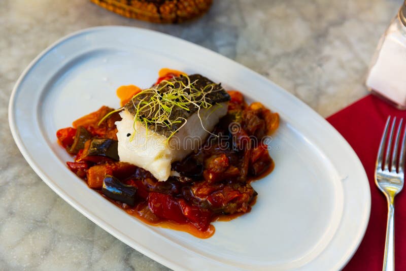 Cod Confit with Vegetable Ratatouille on Plate Stock Photo - Image of ...