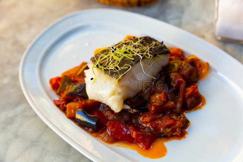 Cod Confit with Vegetable Ratatouille on Plate Stock Image - Image of ...