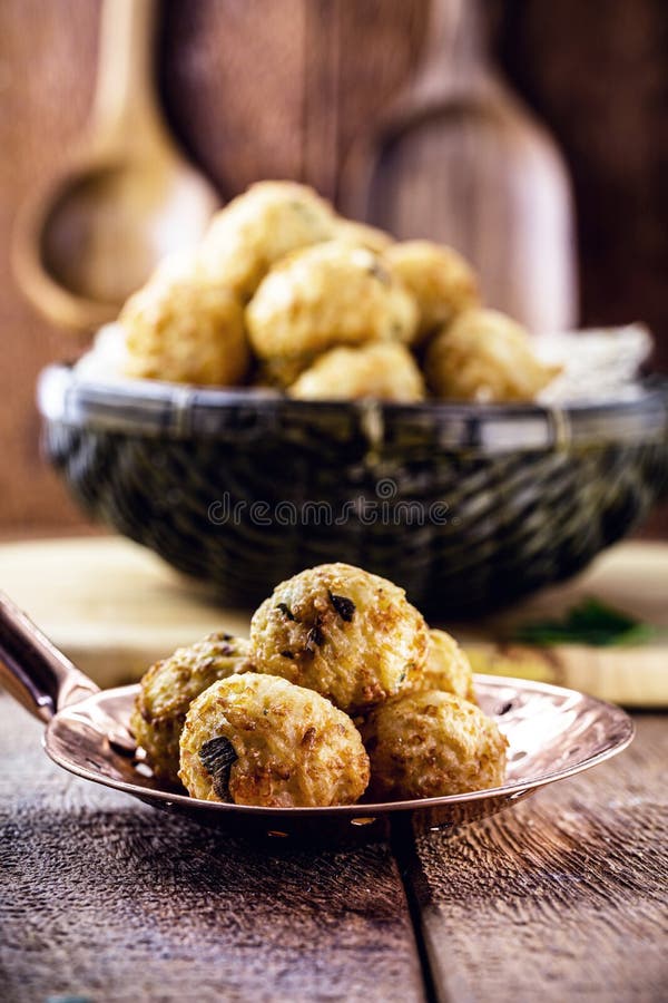 Cod Dumplings, Fish Meat Dumpling in a Slotted Spoon, Fried Salty Stock ...