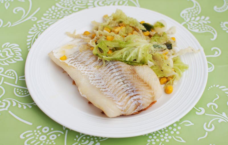 Cod fillet with salad stock image. Image of portion, lettuce - 25783855