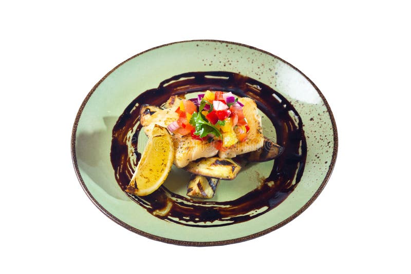 Cod Fillet with Salsa Sauce and a Slice of Lemon Isolated Stock Photo ...