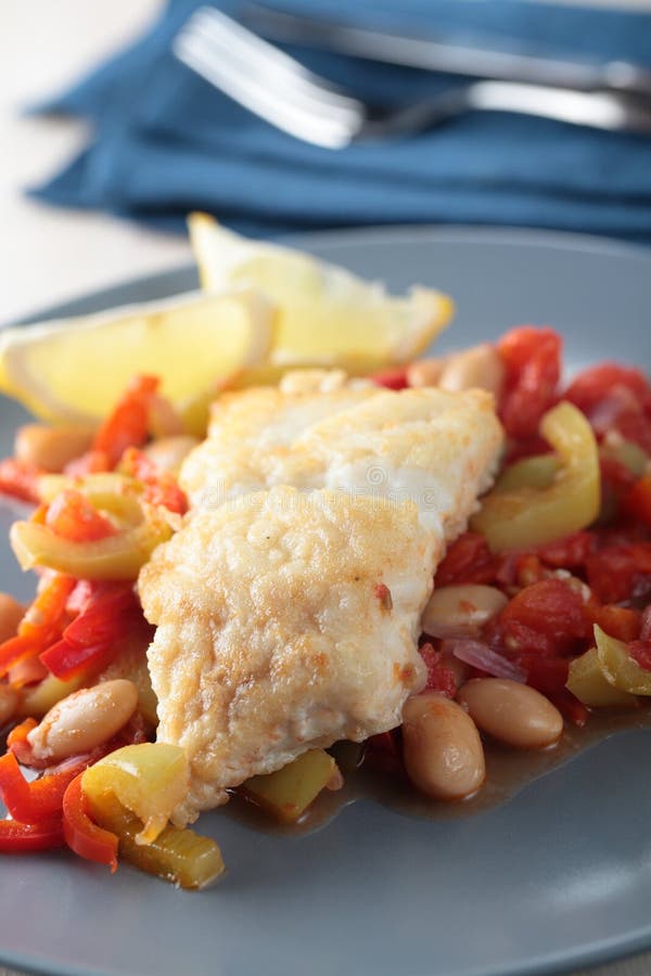 Baked Cod Fillet with Salad Stock Photo - Image of tomato, closeup ...