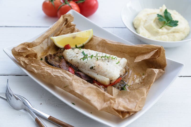 Cod Fillets Baked in Parchment Paper with Vegetables Stock Image ...