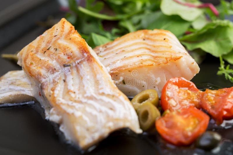 Cod fillets stock photo. Image of fillet, grilled, cherry - 101204332