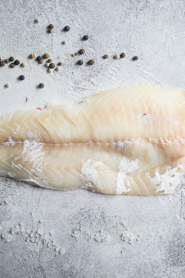 Cod Fillets on a Grey Concrete Background for the Preparation of a ...