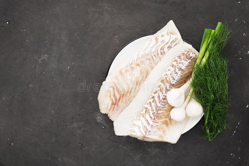 Cod Fillets of White Fish with Fresh Green Garden Bow and Dill on a ...