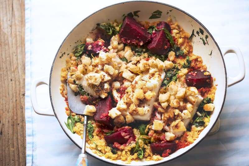 Cod Fish with Breadcrumbs, Beetroot, Spinach and Lentils Stock Image ...