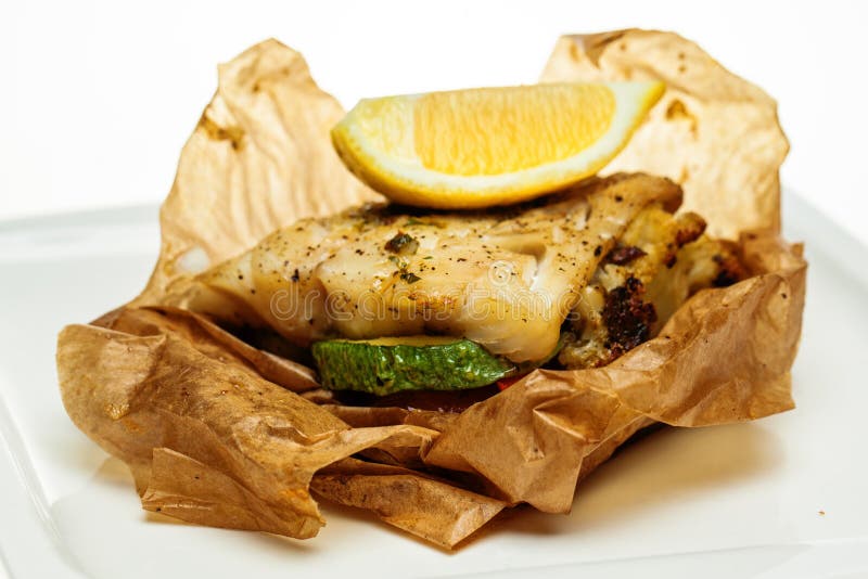 Cod Fish Fillet Closeup. Grilled Cod Fish with Vegetable Stock Photo ...