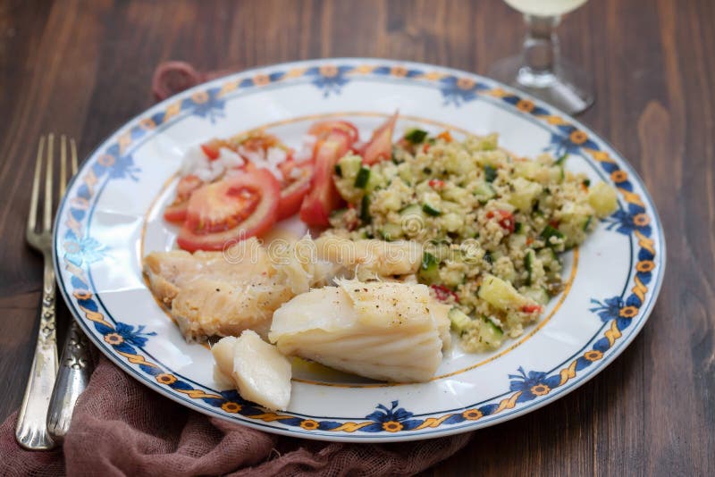 Cod Fish with Quinoa and Fresh Salad on Dish Stock Photo - Image of ...