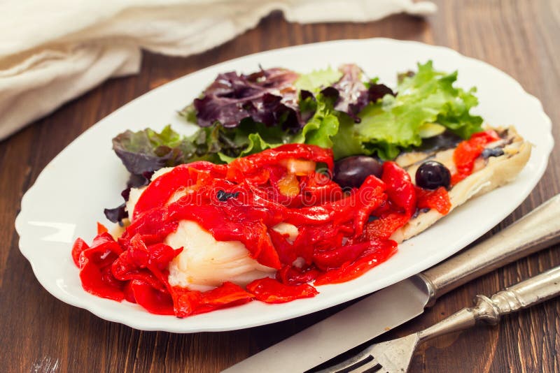 Cod Fish with Red Grilled Pepper and Salad Stock Image - Image of ...