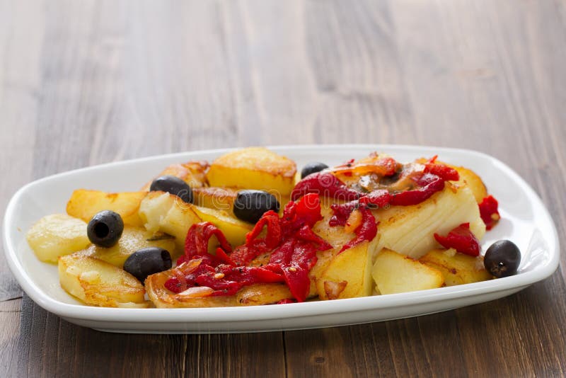 Cod Fish with Red Pepper and Fried Potato Stock Photo - Image of potato ...